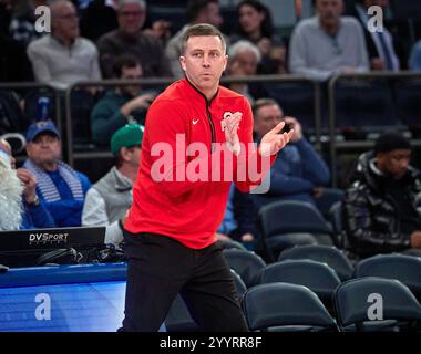 Ohio State head coach Jake Diebler celebrates with forward Sean Stewart ...