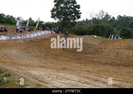 Motocross racers in action on the motocross racing circuit Stock Photo ...