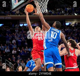 Kentucky forward Brandon Garrison (10) walks off the court after an ...