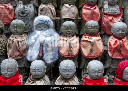 Jizo statues are small stone statues that represent Jizo Bosatsu, a ...