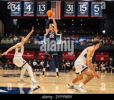 Utah State forward Karson Templin shoots the ball as Colorado State ...