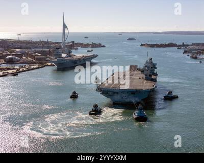 An aerial view of the Royal Navy aircraft carriers HMS Prince of Wales ...