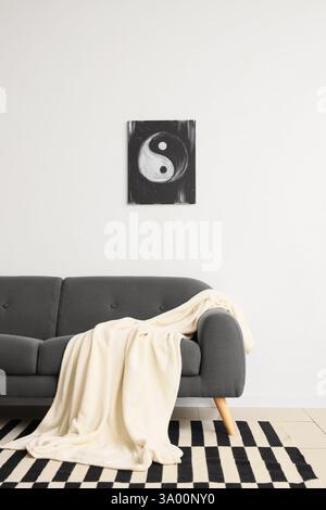 Stylish living room interior and Yin Yang symbol. Feng Shui philosophy ...