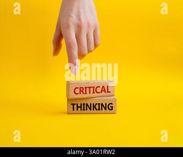 Critical thinking symbol. Wooden blocks with words Critical thinking ...