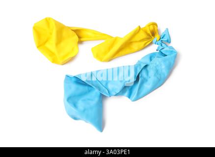 Two color popped balloons isolated on white, top view Stock Photo - Alamy