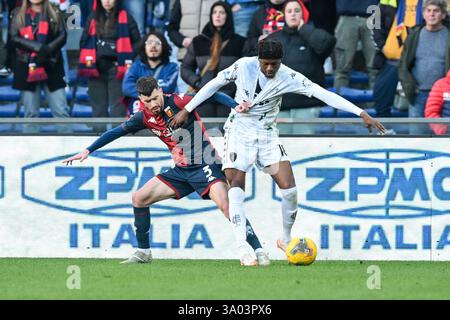 GenoaÕs Aaron Martin fights for the ball with EmpoliÕs Brando Moruzzi ...