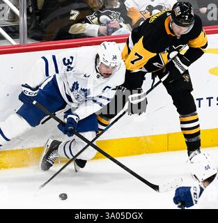 Toronto Maple Leafs' Auston Matthews (34) is stopped by Florida ...