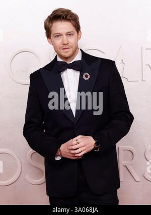 Joe Alwyn arrives at the Oscars on Sunday, March 15, 2026, at the Dolby ...
