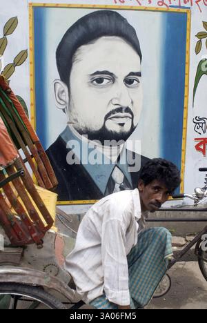 Cycle Rickshaw Rider with the wall painting of Begum Khaleda, Dhaka ...