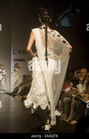 Modeling, Indian female model walking on ramp in designer clothes ...