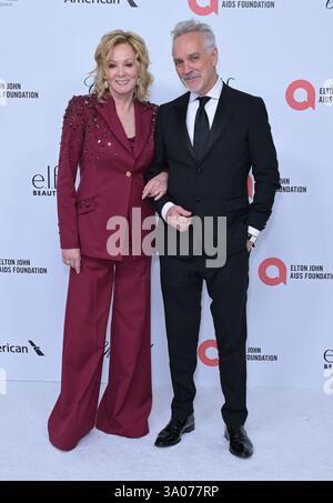 Joe Pacheco and Jean Smart arriving at the 83rd Annual Golden Globes ...
