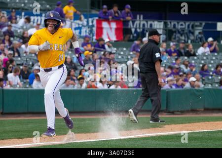 LSU infielder Daniel Dickinson (14) throws during an NCAA baseball game ...