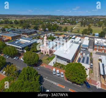Aerial view of the old courthouse next to the modern Police station ...