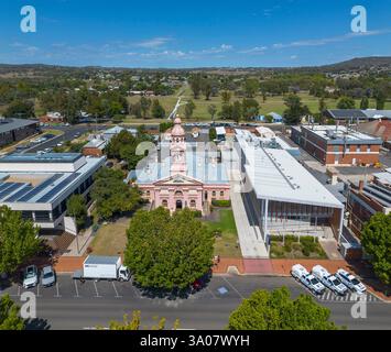 Aerial view of the old courthouse next to the modern Police station ...