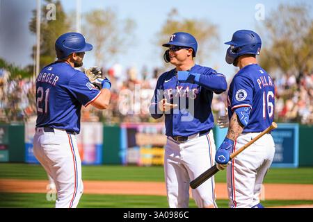 Texas Rangers' Jake Burger celebrates as he walks to the dugout after ...