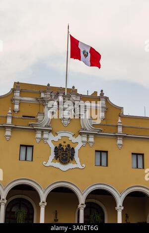 Peruvian flag at City Hall of Lima - Peru Stock Photo - Alamy