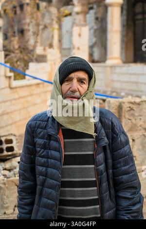 Damascus, Syria - December 31, 2024: This old man settled in Yarmouk ...