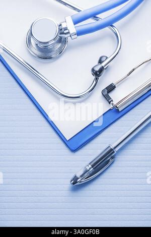 stethoscope clipboard ballpoint pen on vintage wooden board medical ...