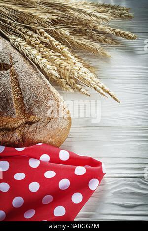 Bread wheat ears red polka-dot napkin on wooden board Stock Photo - Alamy