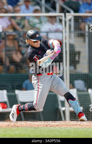 Minnesota Twins' Harrison Bader (12) bats during the eighth inning of a ...