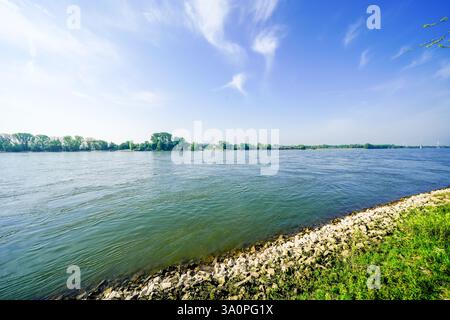 View of nature and the promenade in Rees. City on the Rhine with the ...