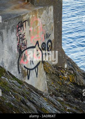 Eat The Rich graffiti Stock Photo - Alamy