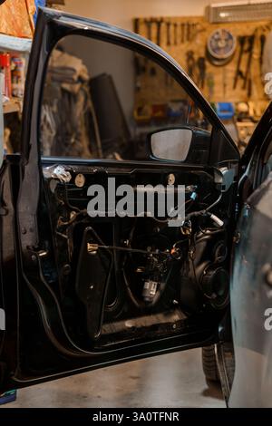 Inside View of a Car Door with Exposed Mechanisms and Wiring Stock ...