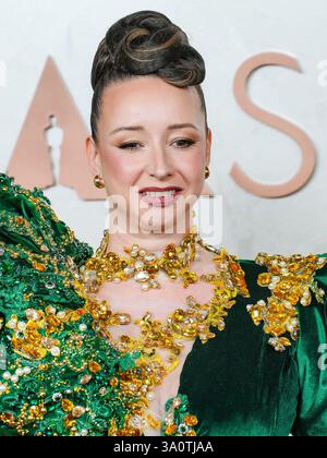 Laura Blount walking on the red carpet at the The 97th Academy Awards ...