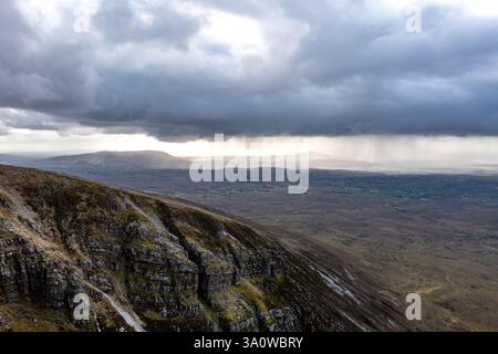 Aerial view of the Muckish mountain and the trail called miners path in ...