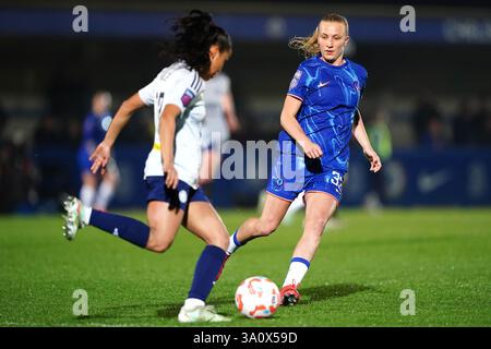 Chelsea's Aggie Beever-Jones (right) celebrates with Ellie Carpenter ...