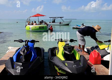 A local guide getting Jet skis ready for tourist to rent on Secret ...