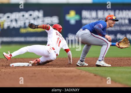 St. Louis Cardinals' Victor Scott II, left, celebrates with Jose ...