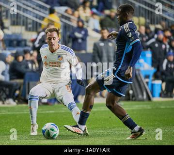 FC Cincinnati forward Corey Baird (11) is tripped by Toronto FC ...