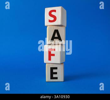 Safe or unsafe symbol. Concept word Safe Unsafe on wooden cubes ...