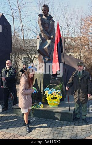 The monument to Roman Shukhevych is pictured during the gathering to ...