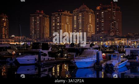 Nighttime view of the iconic I Love Qatar Sign, a symbol in Doha, blue ...