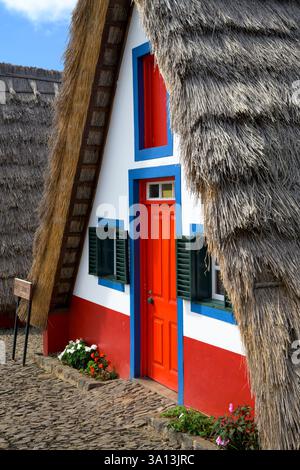 Traditional triangular houses in Santana, Madeira island, Portugal ...