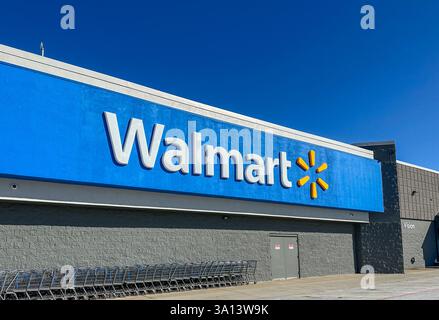 Walmart store sign and shopping carts against blue sky. Merrillville ...