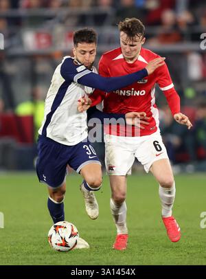 AZ Alkmaar's Peer Koopmeiners (left) and Tottenham Hotspur's James ...
