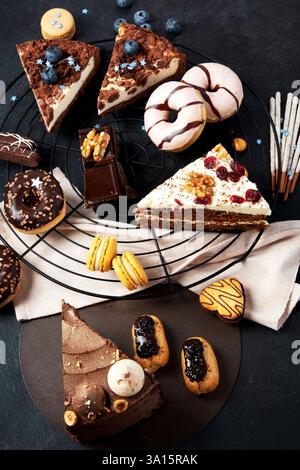 A top view of various delicious cakes on the white surface Stock Photo ...