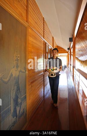 Laos, Mekong river, teak passageways on the Gypsy, a rive barge that ...