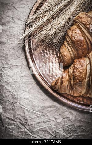 Golden wheat rye ears fresh-baked croissants on wooden board Stock ...