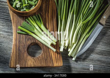 green chopped onions on wooden cutting board kitchen knife vintage wood ...