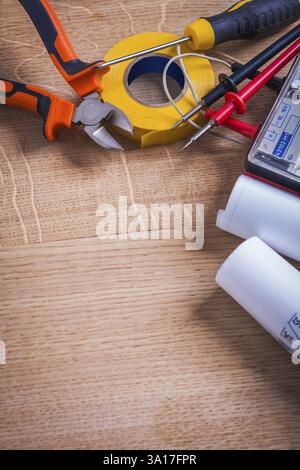 Yellow electrical tester wires nippers on metallic background copy ...