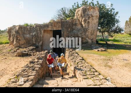 Cyprus, Paphos, Tombs of the Kings, Children Exiting Chamber Tomb Stock ...