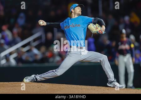 Miami Marlins pitcher Adam Mazur aims a pitch during the first inning ...