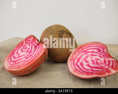 One whole and one halved Chioggia ringlet on paper Stock Photo - Alamy