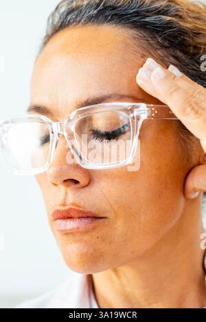 Stress, headache, migraine, upset middle-aged woman holding her head ...