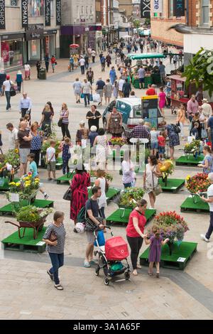 Market square wheelbarrows display Stock Photo - Alamy