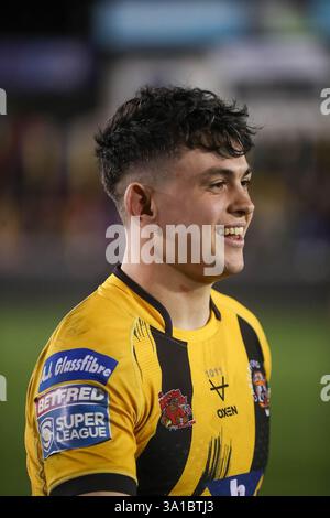 Cain Robb of Salford Red Devils tackles Sam Stone of Warrington Wolves ...